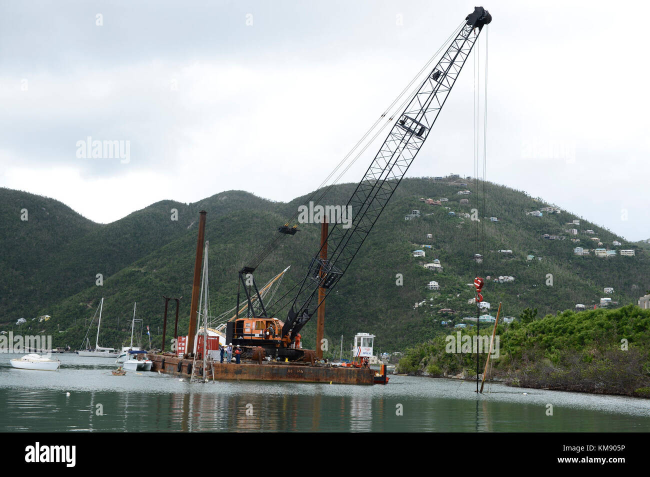 coast guard strike team members oversee the personnel from resolve ...