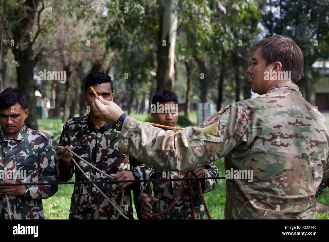 A U.S. Air Force 320th Special Tactics Squadron pararescueman teaches ...
