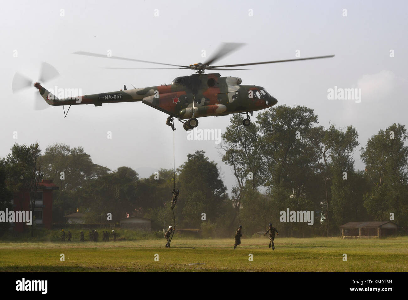 Nepalese Mahabir Rangers practice fast roping from a Mi-17 during ...