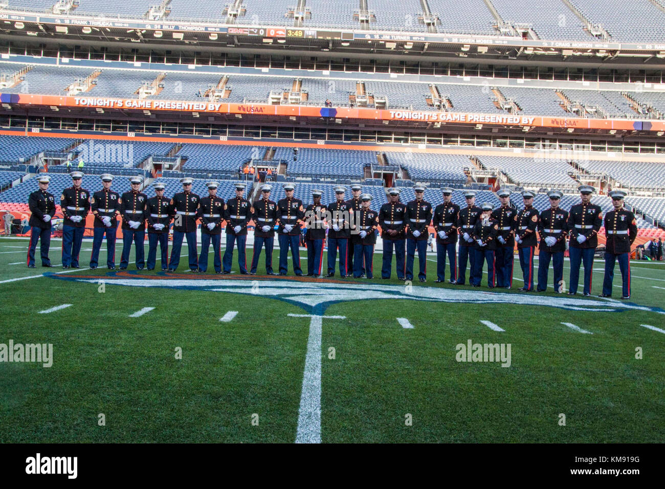 Marines with Recruiting Station Denver pose on the Denver Broncos field ...