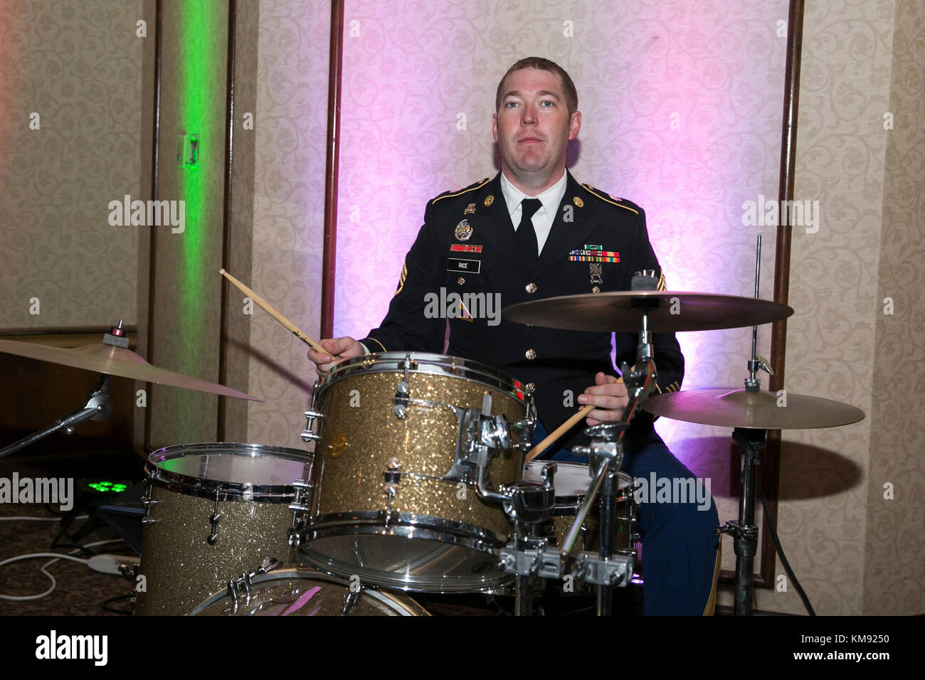 U.S. Army Staff Sgt. Peter Rice, from the Army Materiel Command's band ...
