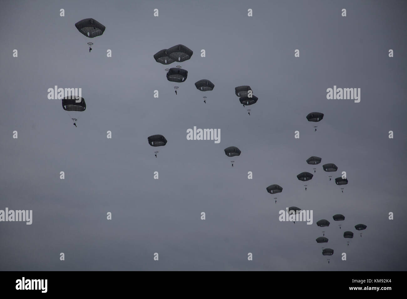 Paratroopers fill the sky at Sicily Drop Zone for the 20th Annual Randy ...