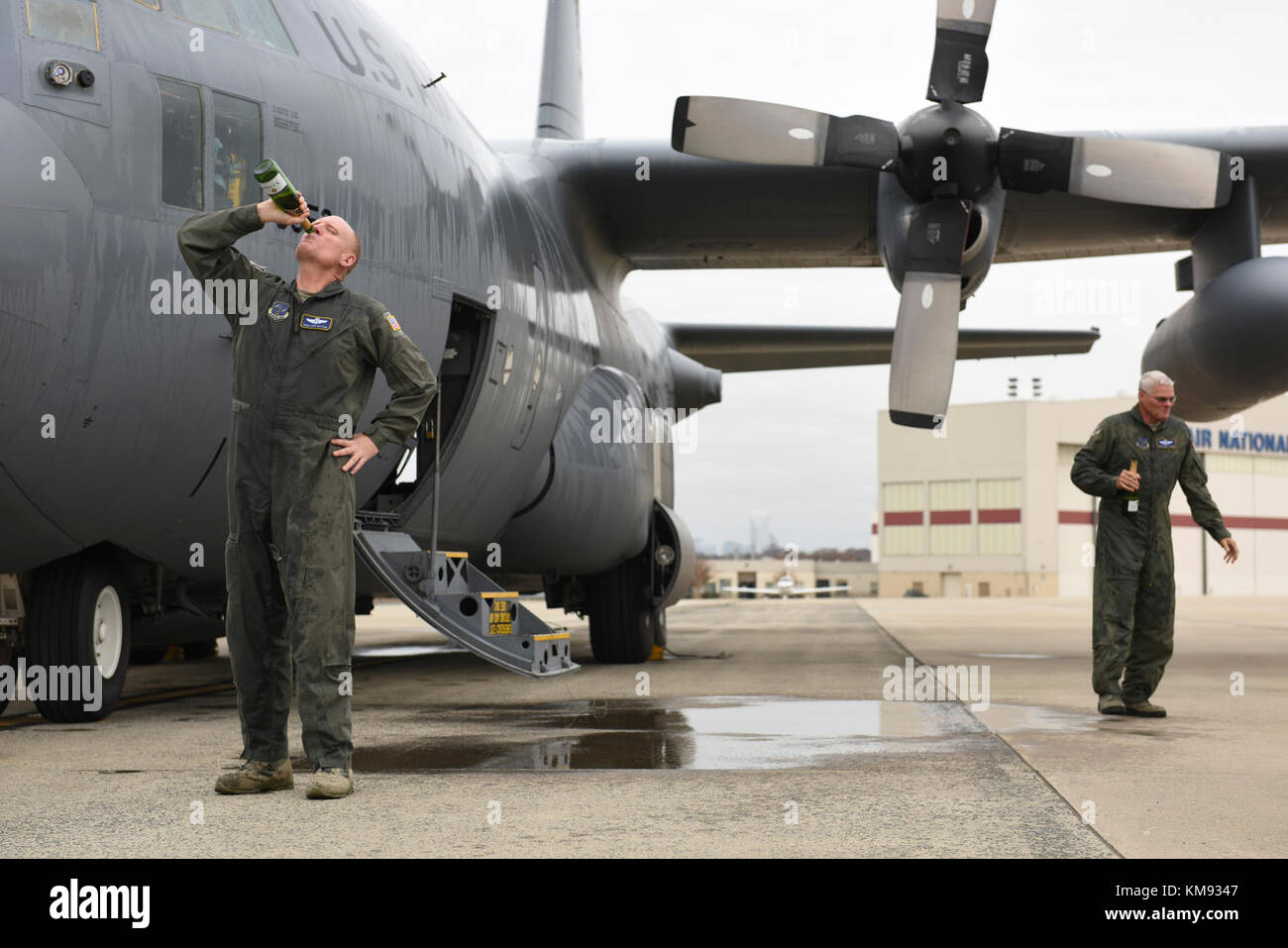 U.S. Air Force Senior Master Sgt. Christopher Whitcomb (left) and ...