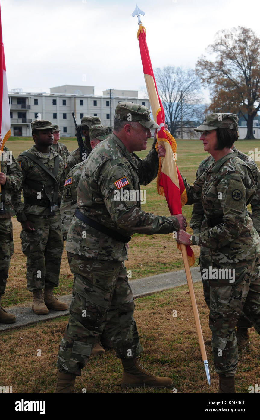 Maj. Gen. Donald B. Tatum receives the unit colors from Maj. Gen ...