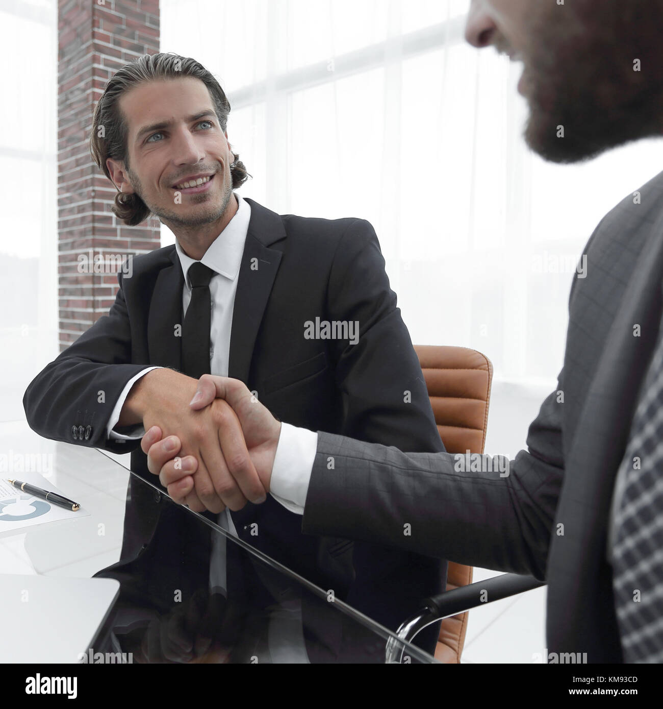 closeup. business handshake in an office Stock Photo - Alamy