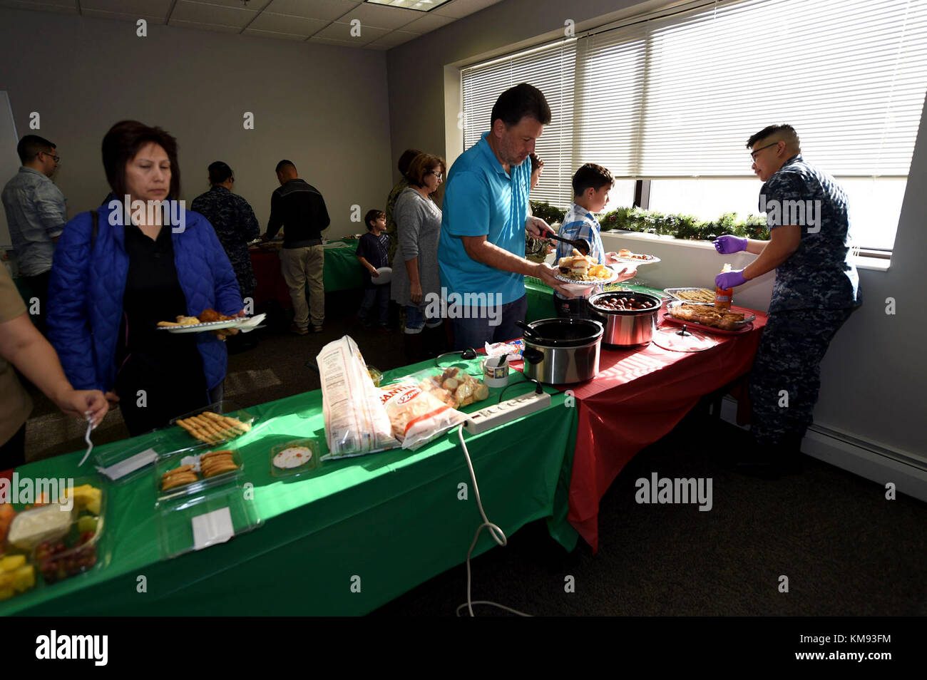 Sailors and their family members get to enjoy the annual potluck held ...