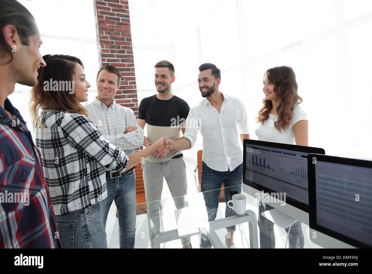 friendly handshake between Manager and employee Stock Photo - Alamy