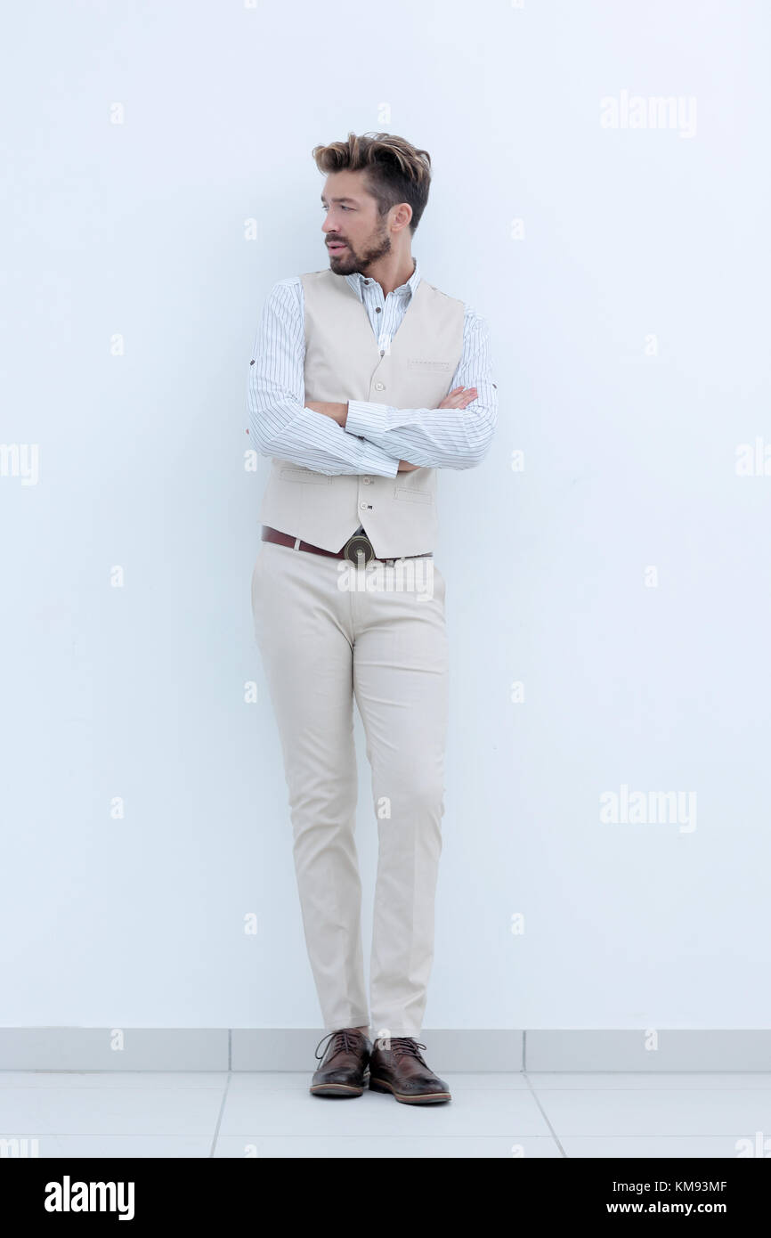 Full length portrait of stylish man with crossed hands Stock Photo - Alamy