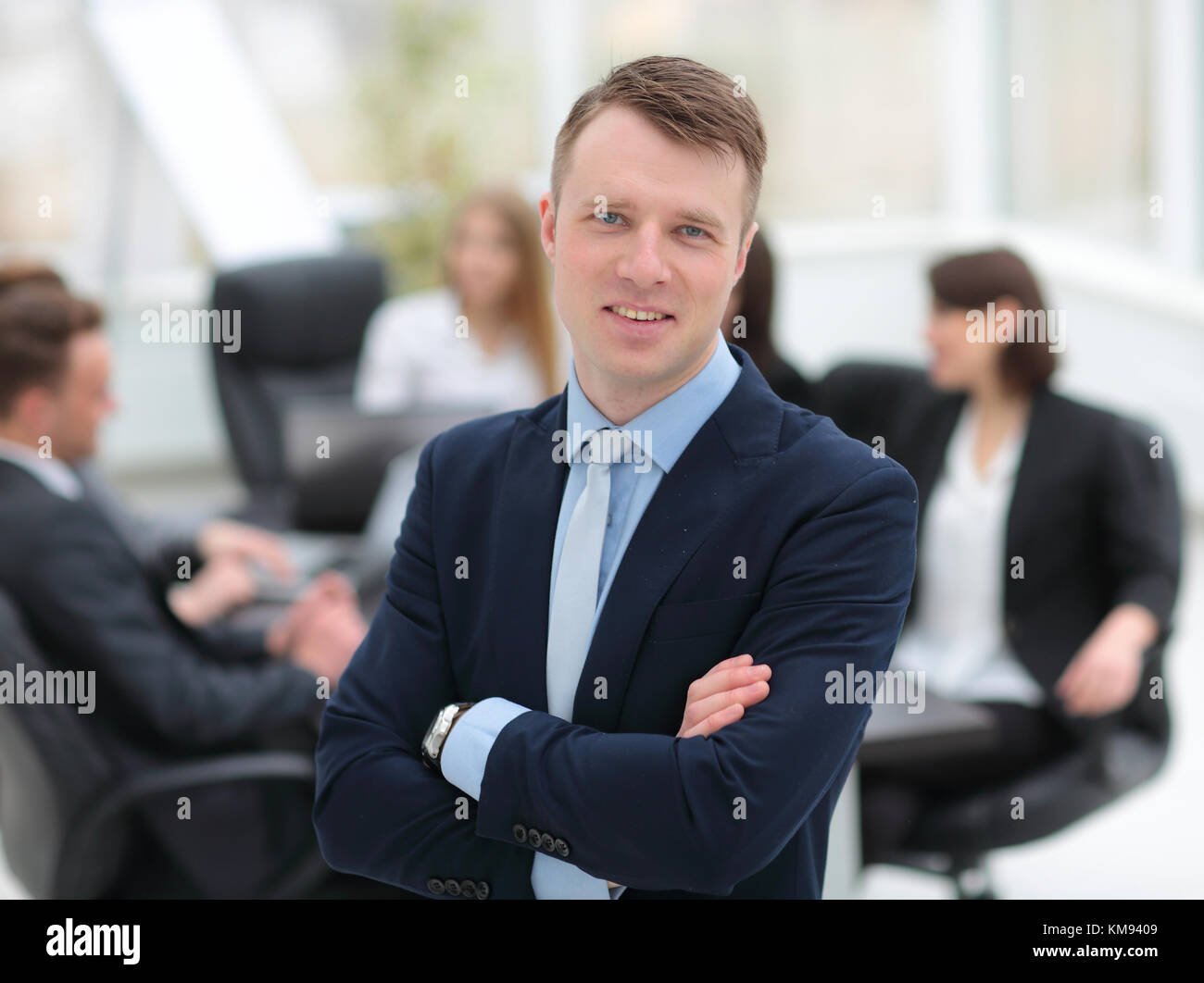 successful Manager on the background of business team Stock Photo - Alamy