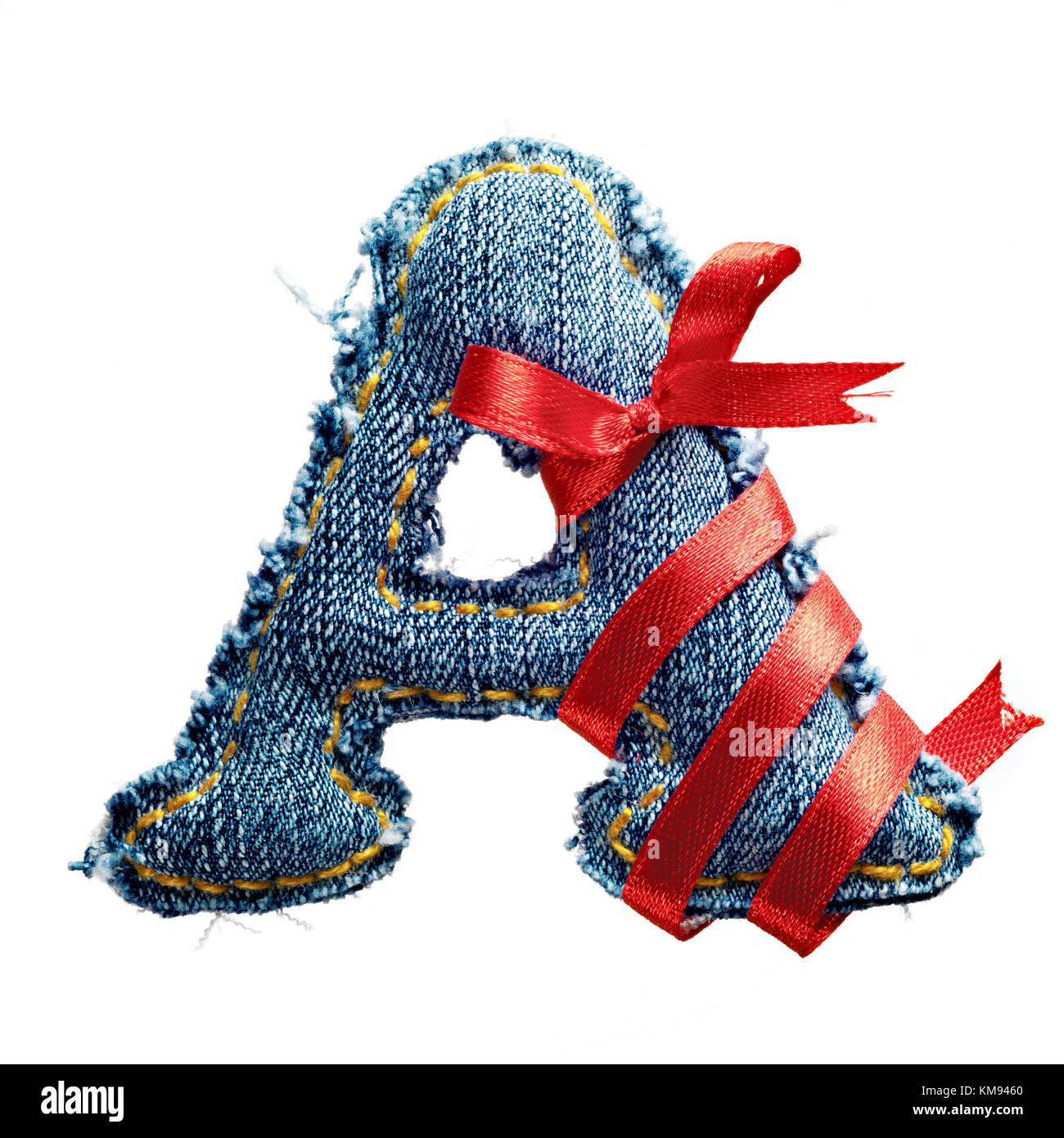 Magic holiday jeans alphabet letter A with red ribbon Stock Photo - Alamy