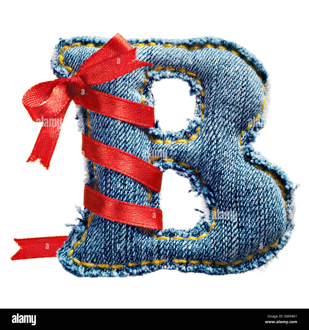 Magic holiday jeans alphabet letter B with red ribbon Stock Photo - Alamy