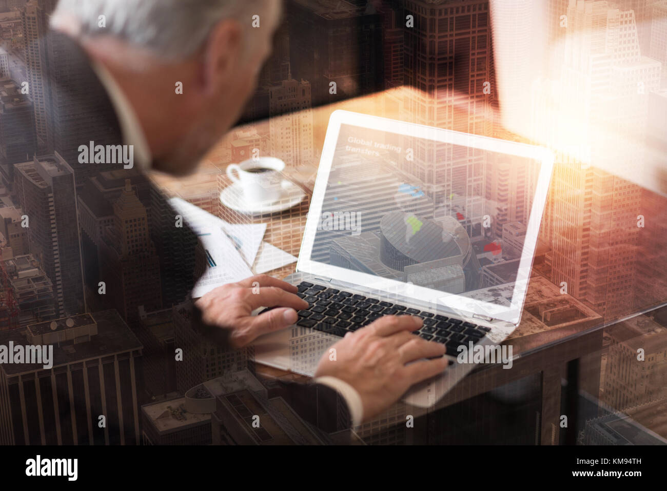 Mature gentleman working on business project at laptop Stock Photo - Alamy
