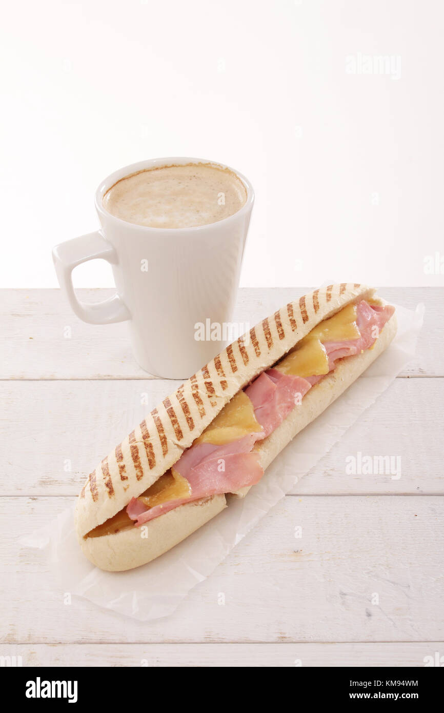 cheese and ham panini with coffee Stock Photo - Alamy