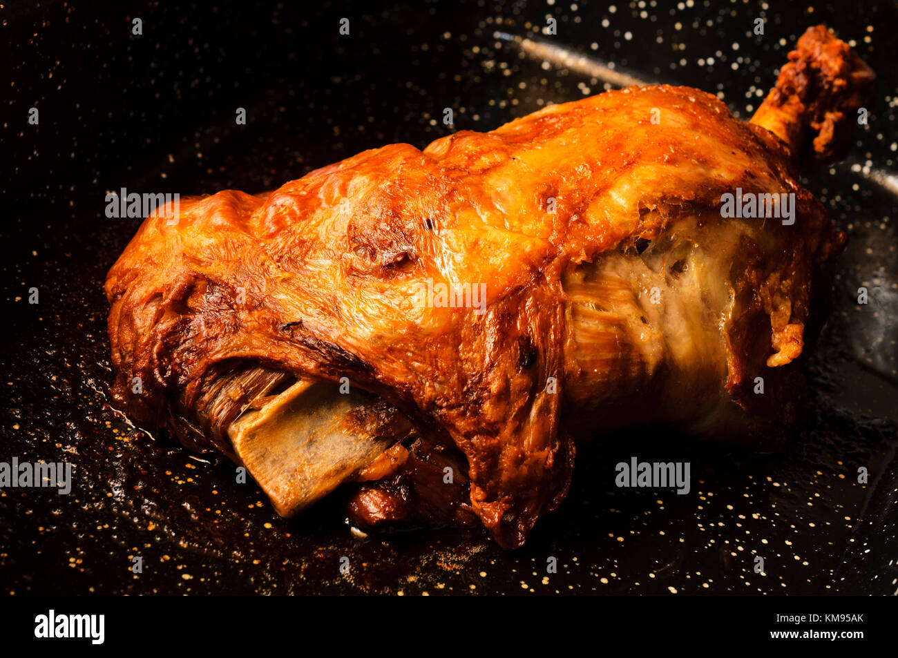 Grilled lamb meat on black background in low key Stock Photo - Alamy