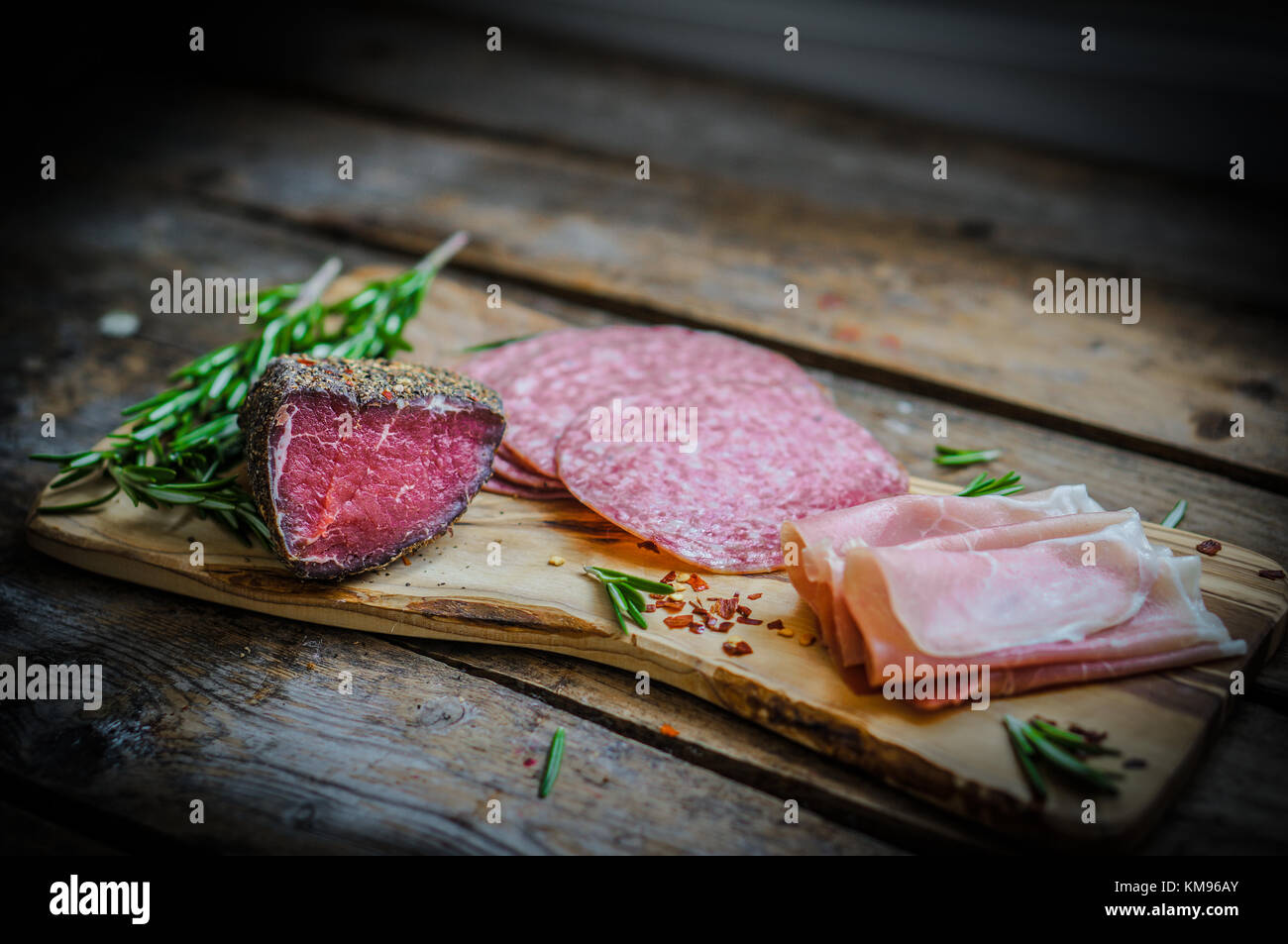 Dried Meat With Pepper And Salt On Rustic Wooden Background Stock Photo ...