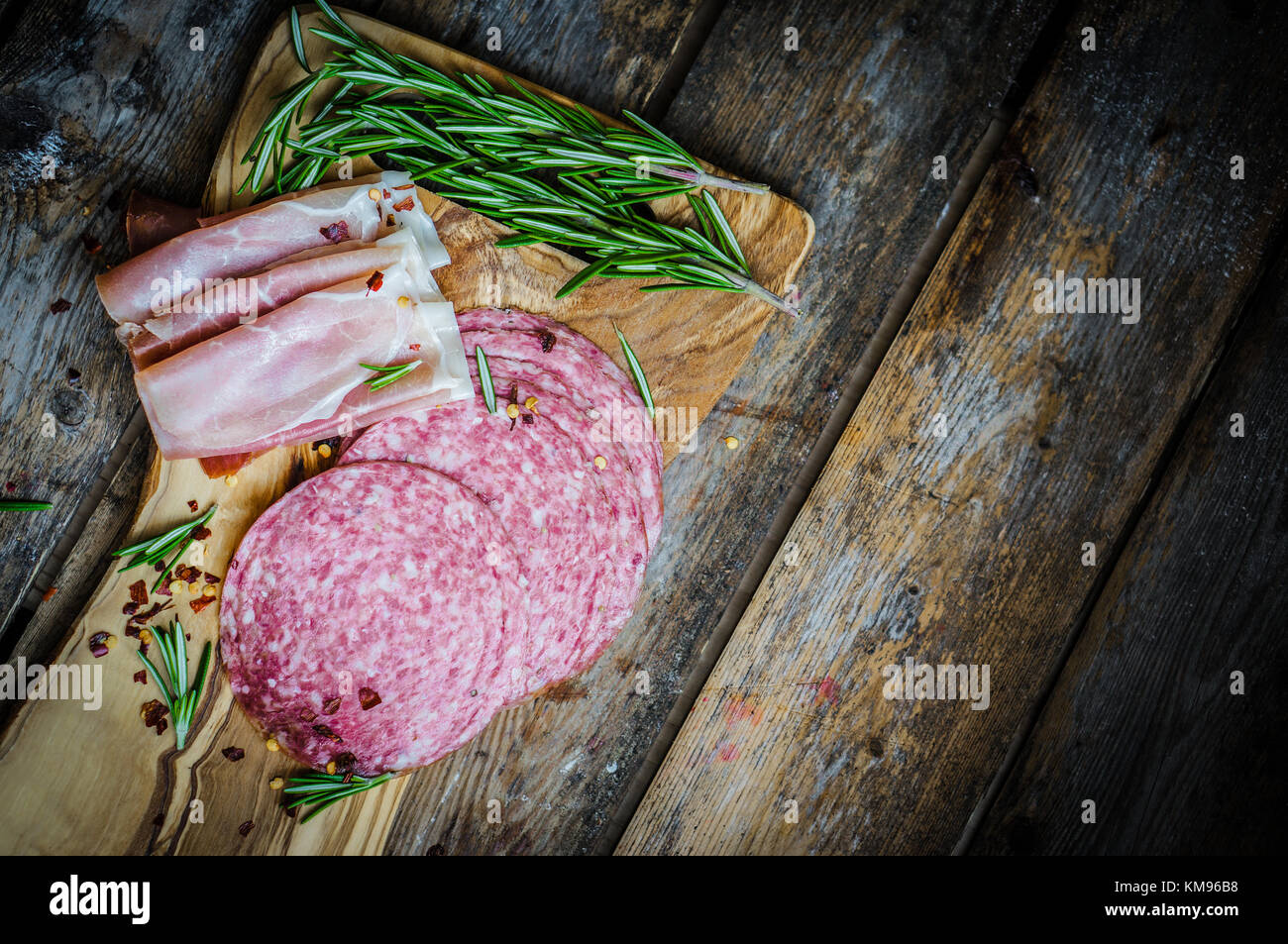Dried Meat With Pepper And Salt On Rustic Wooden Background Stock Photo ...