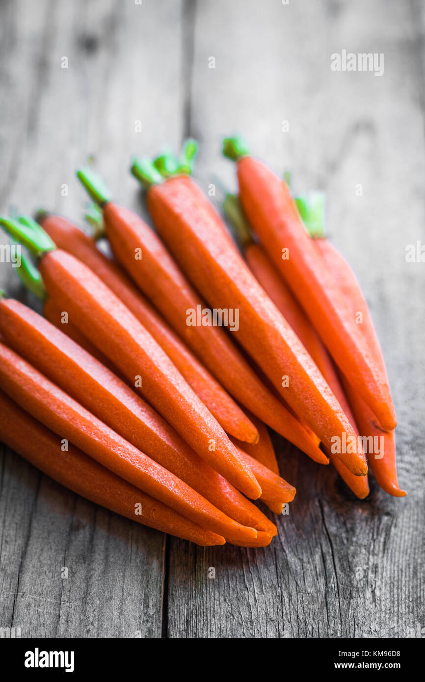 Farm raised baby carrots Stock Photo - Alamy