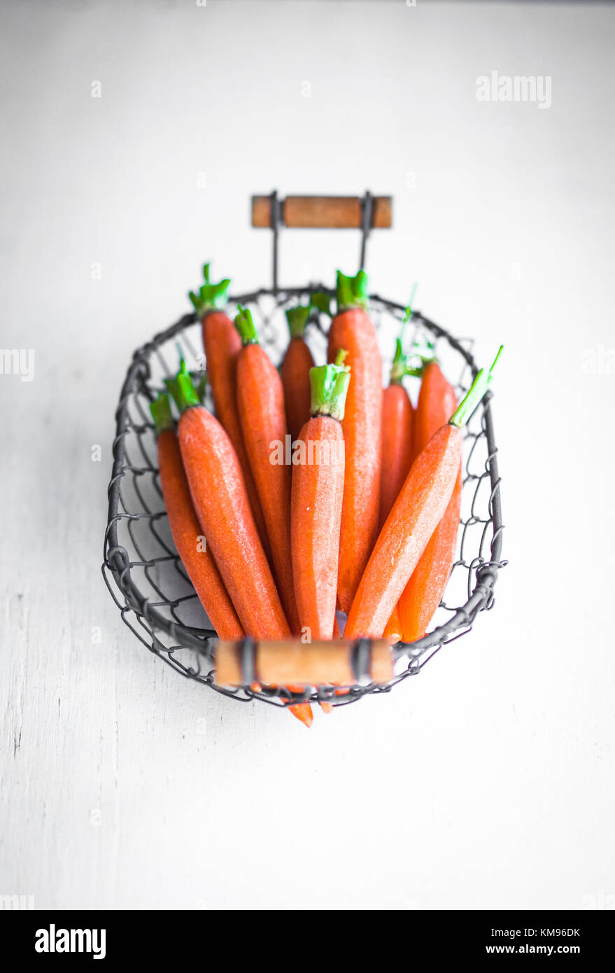 Farm raised baby carrots Stock Photo - Alamy