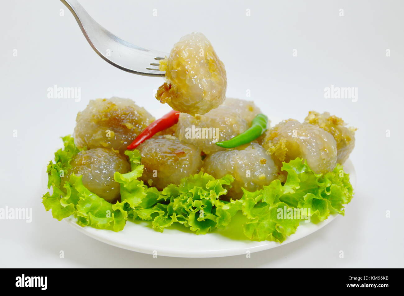 tapioca balls with pork filling on fork Stock Photo - Alamy