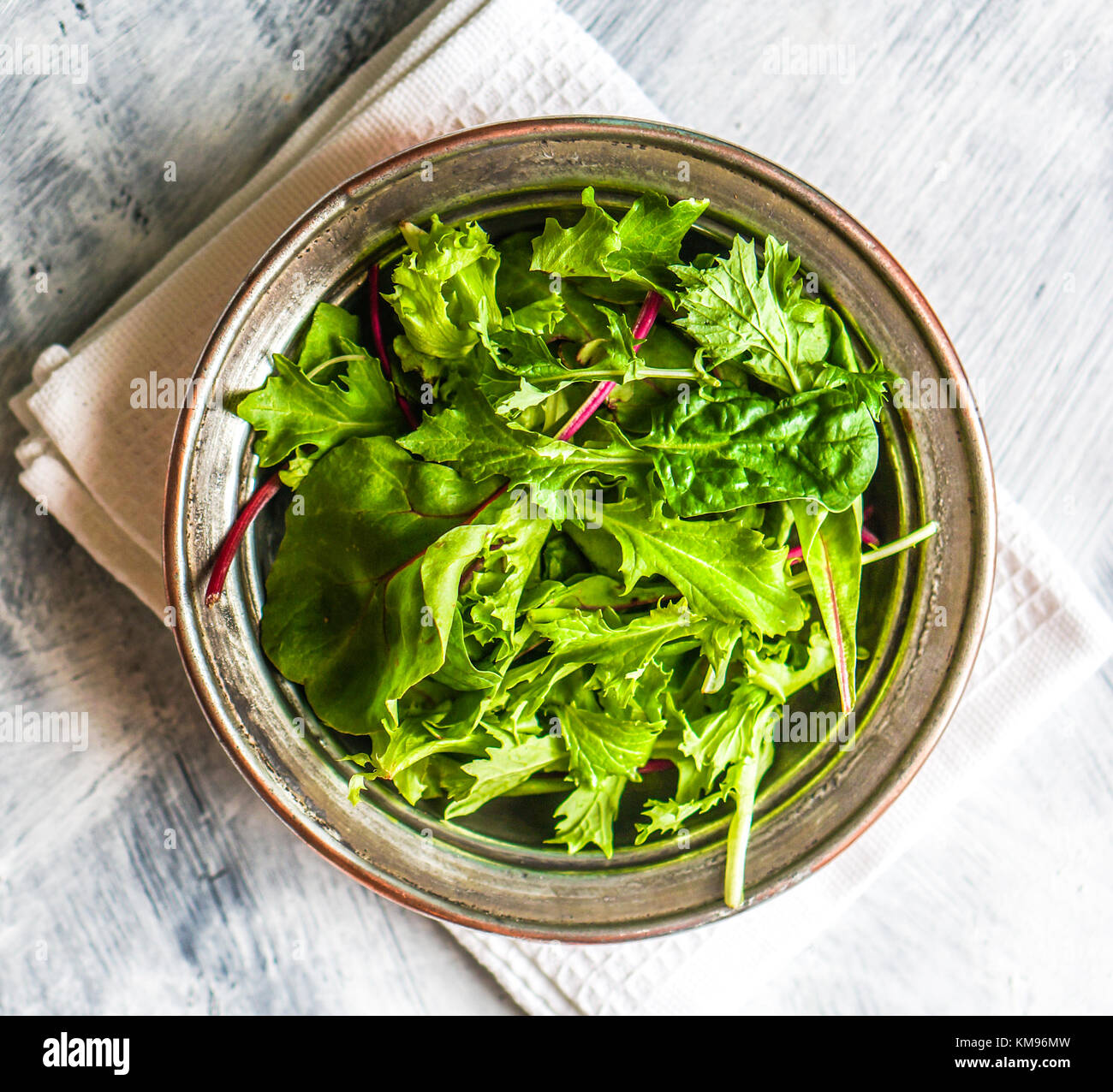 Green Salad On Rustic Background Stock Photo - Alamy