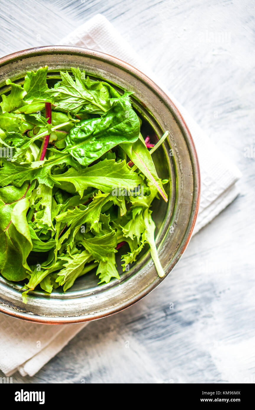 Green Salad On Rustic Background Stock Photo - Alamy