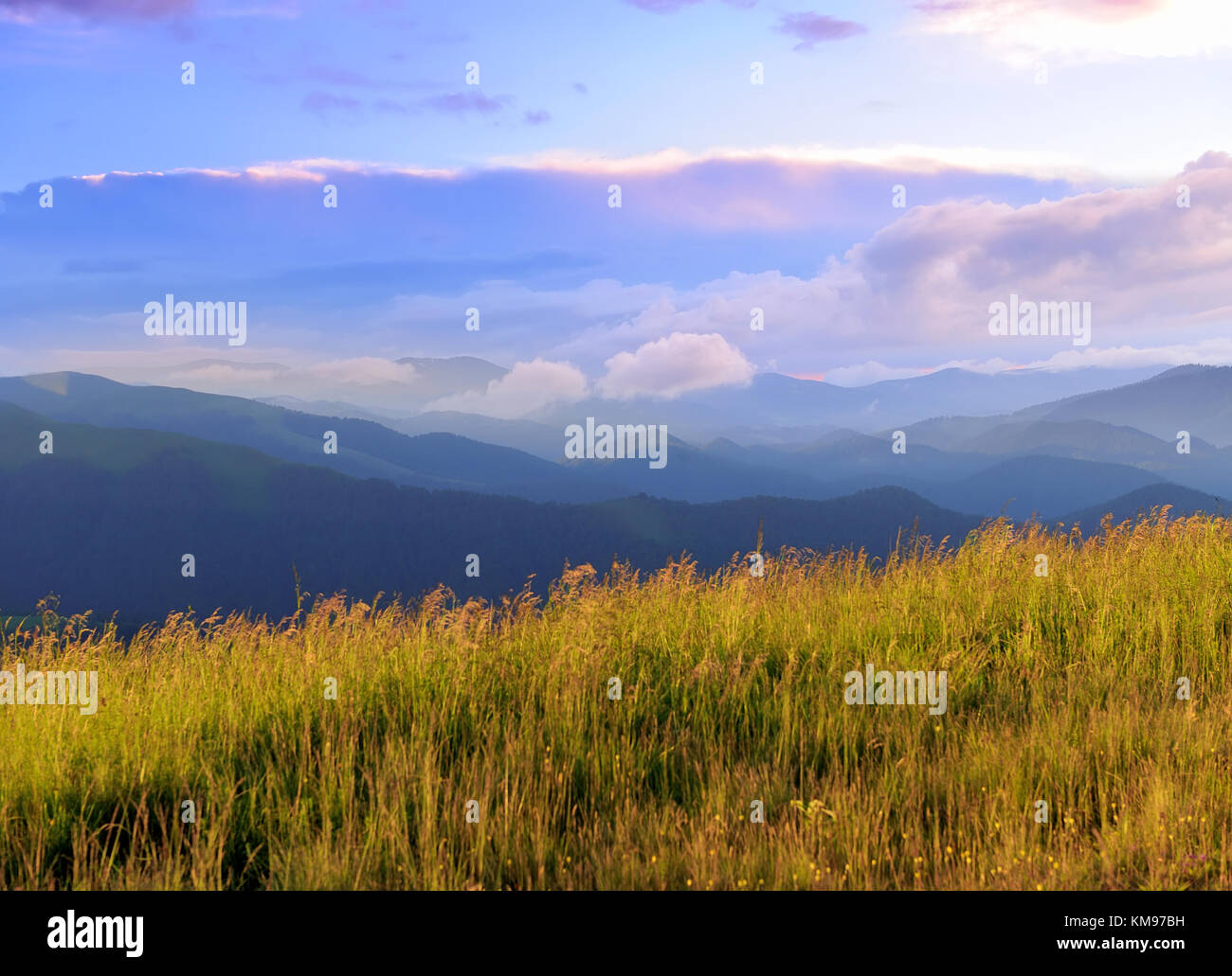 Beautiful sunset in the mountains landscape Stock Photo - Alamy