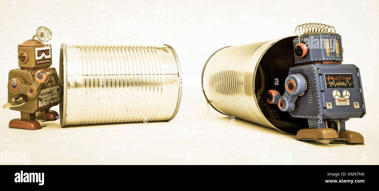 retro robot and old tin can with string (phone concept Stock Photo - Alamy