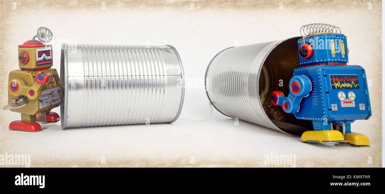 retro robot and old tin can with string (phone concept Stock Photo - Alamy