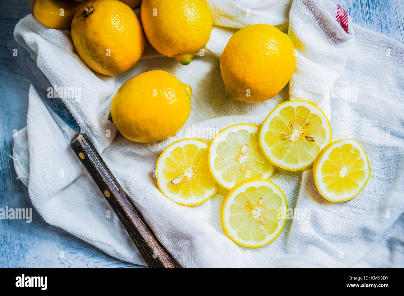 Lemons On Rustic Background Stock Photo - Alamy