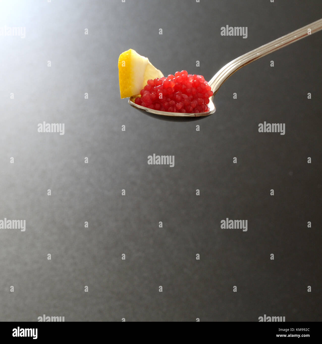 serving red lumpfish eggs Stock Photo - Alamy