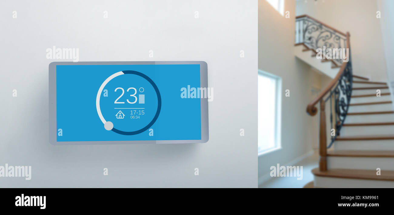 Screen of digital tablet against staircase and chandelier at home Stock ...