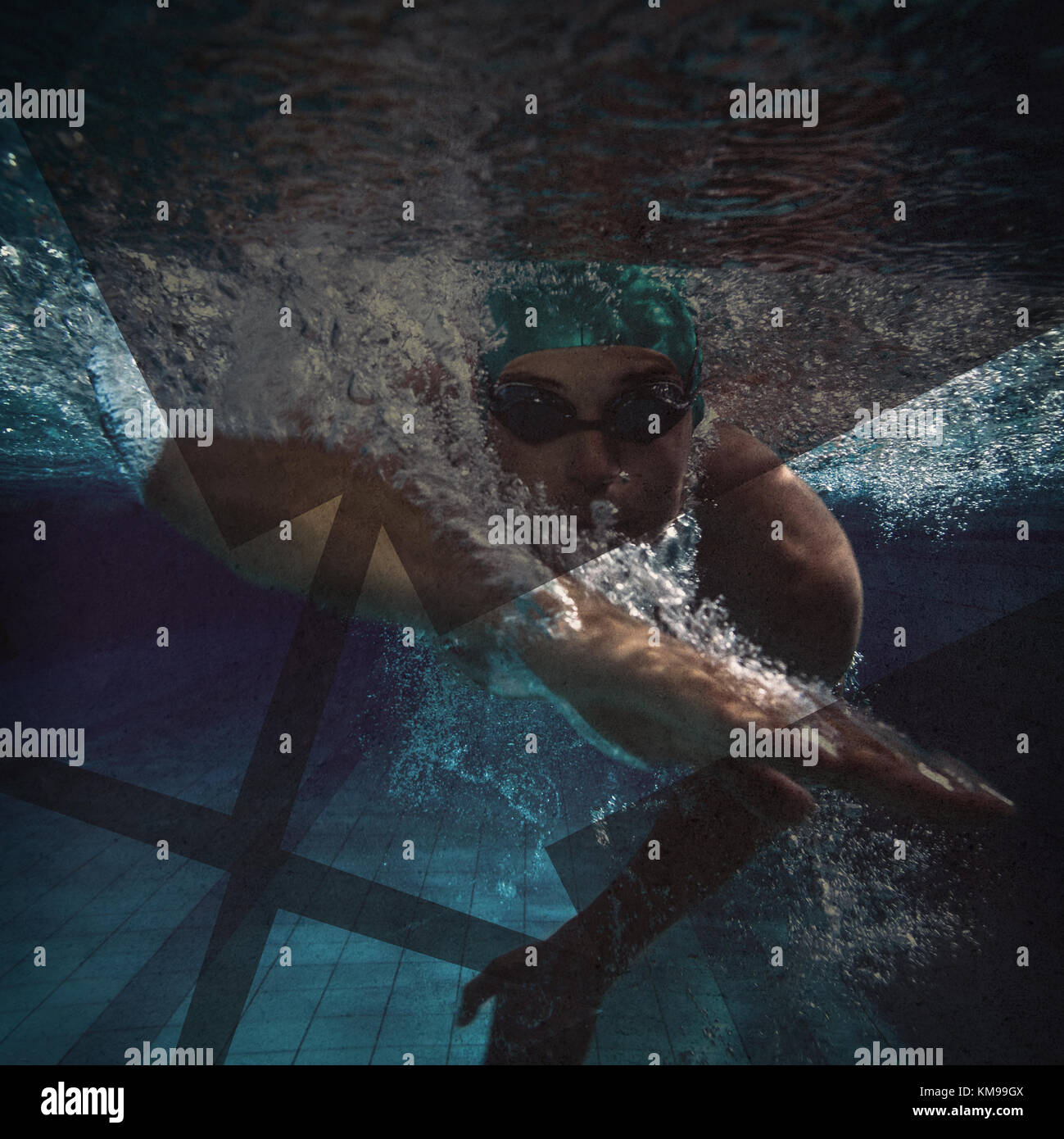 Fit swimmer training by himself in the swimming pool at the leisure ...