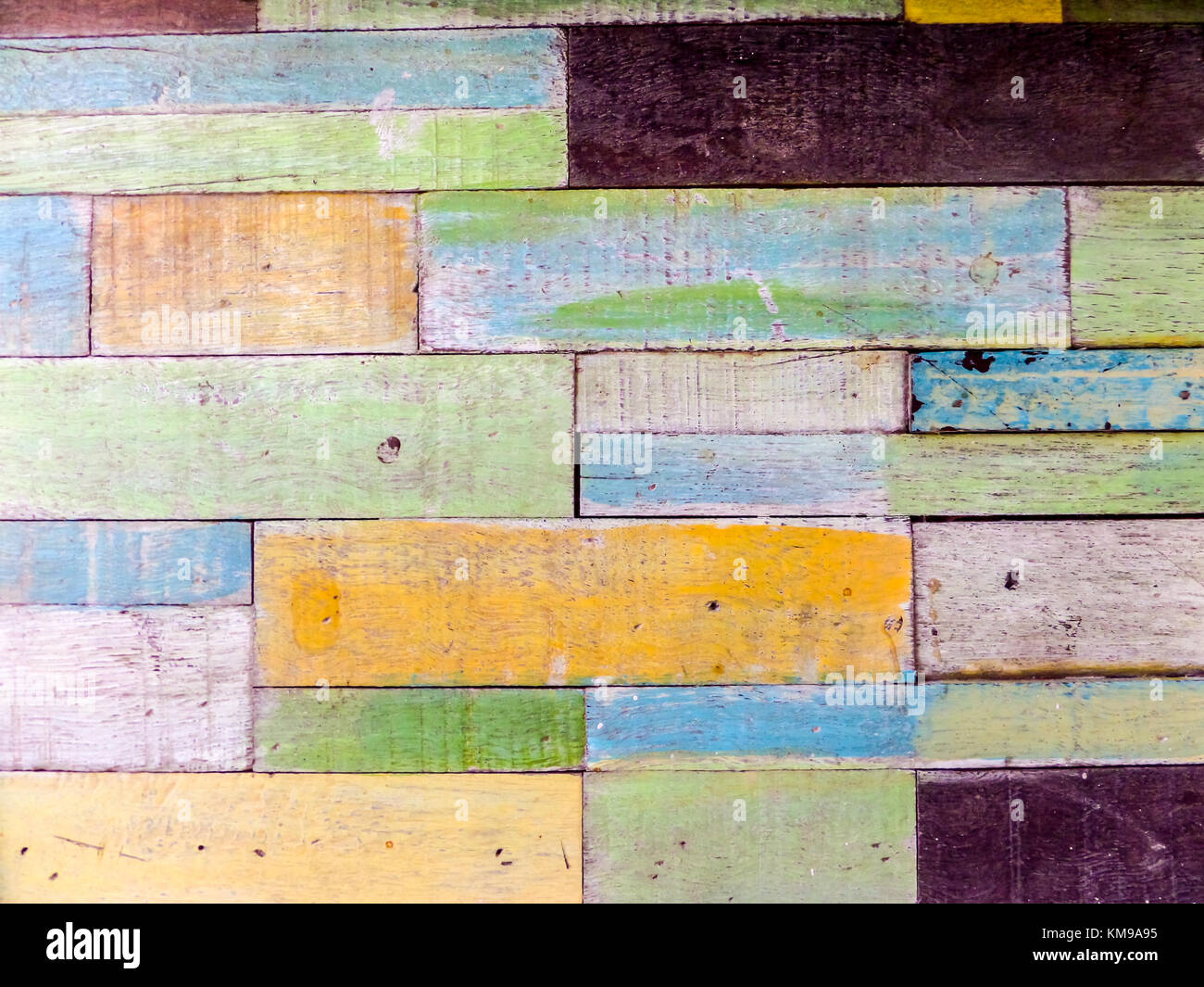 Wood pieces random fancy color on surface Stock Photo - Alamy