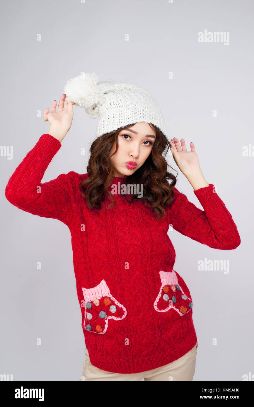 Portrait of beauty winter asian girl in knitted woolen clothing hat ...