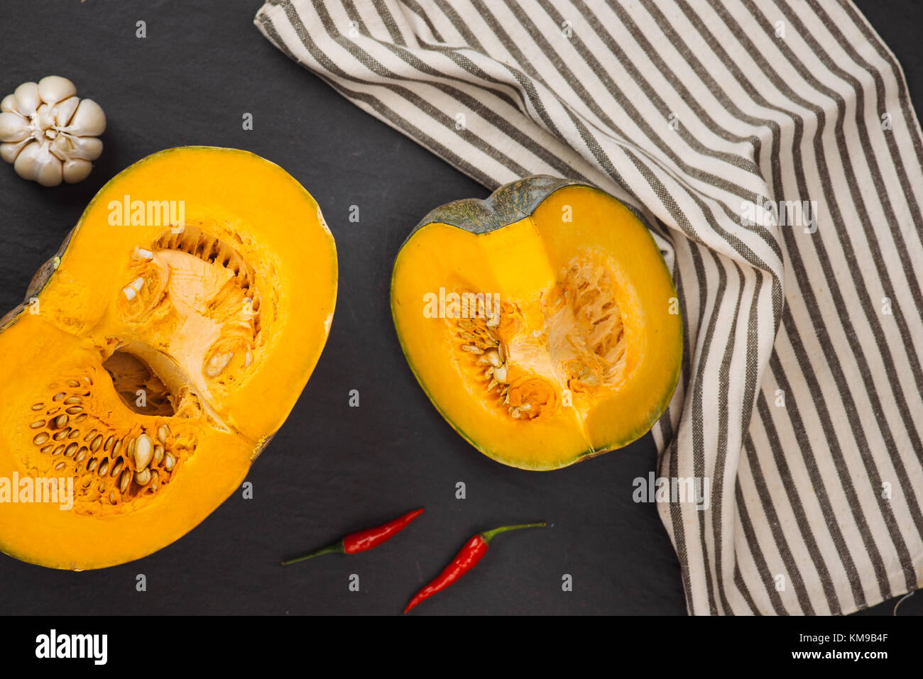 Ripe pumpkin, sliced pumpkin, pumpkin on the table Stock Photo - Alamy