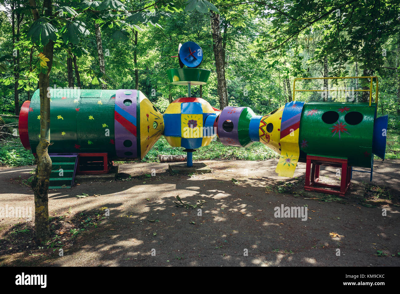 Rocket on old Soviet era playground equipment in Topilche Hydropark in ...
