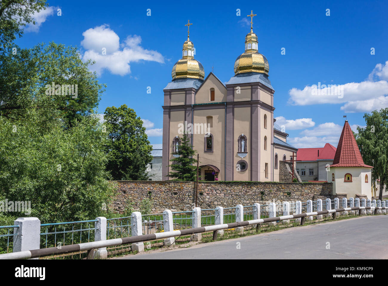 Church of Carmelite monastery seen from bridge over Hnizna River on ...