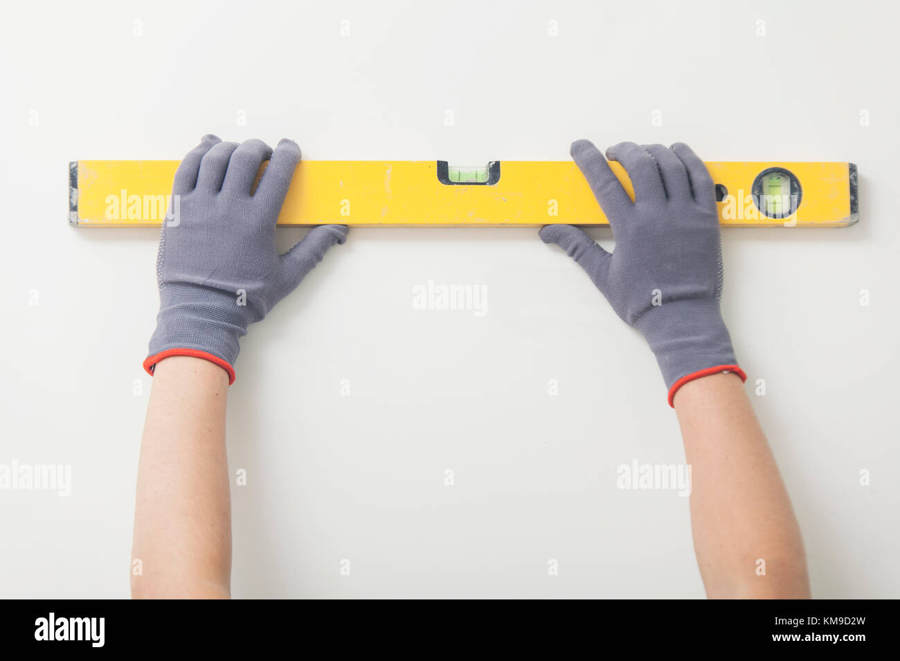 Use of the measuring tool for level installation Stock Photo - Alamy