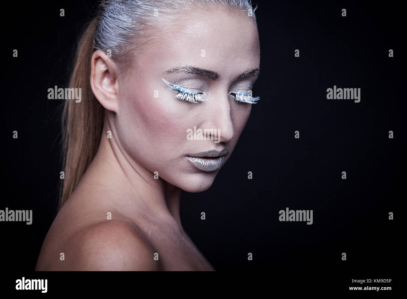 Portraits of a young fashion model as ice queen Stock Photo - Alamy