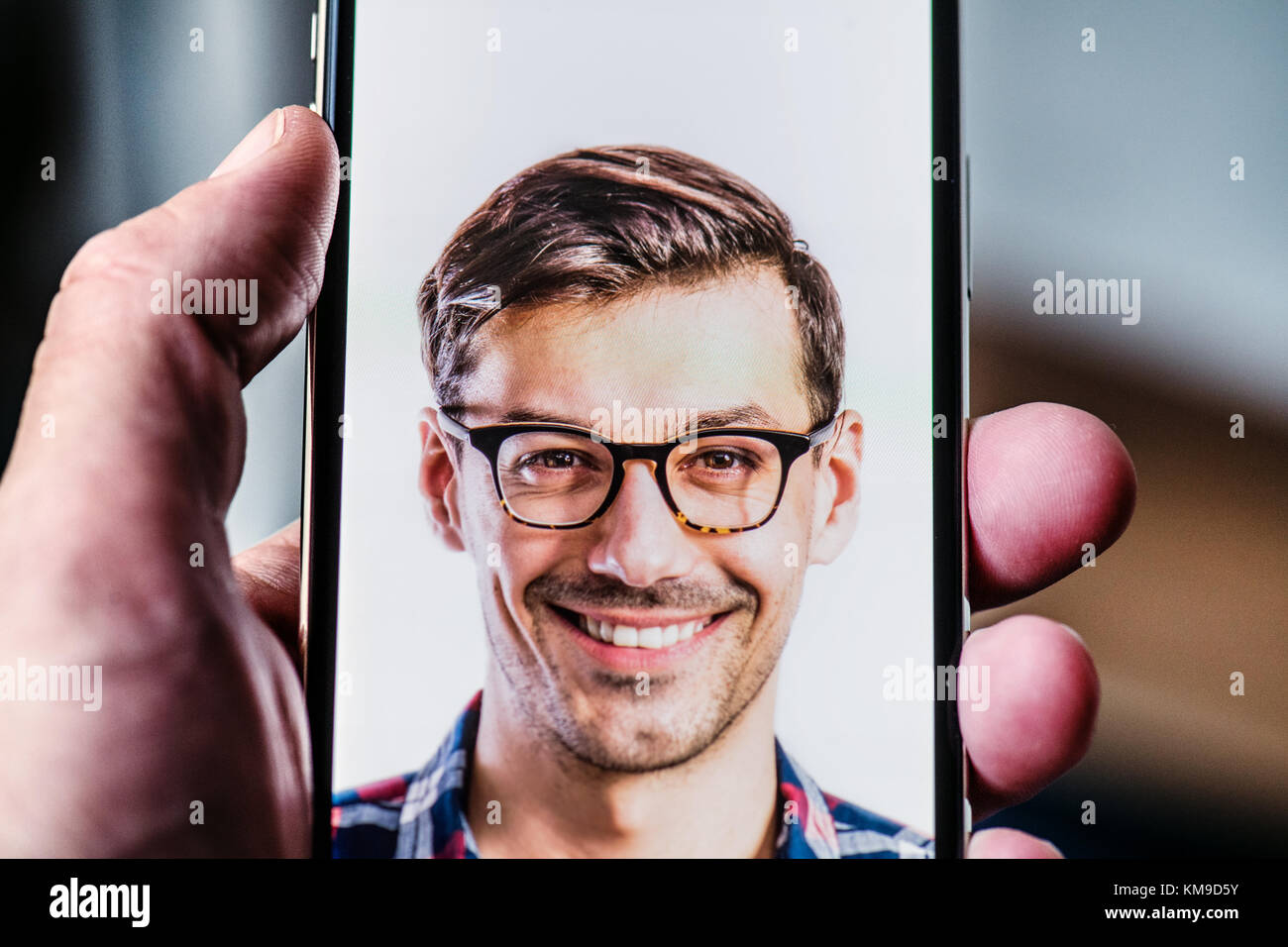 A smartphone using face ID recognition system Stock Photo - Alamy