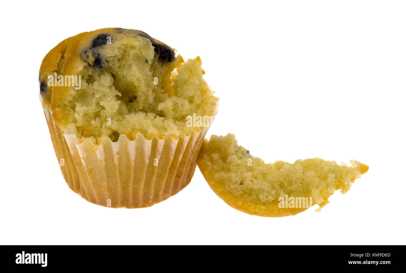 Side view of a bite size blueberry muffin broken isolated on a white ...