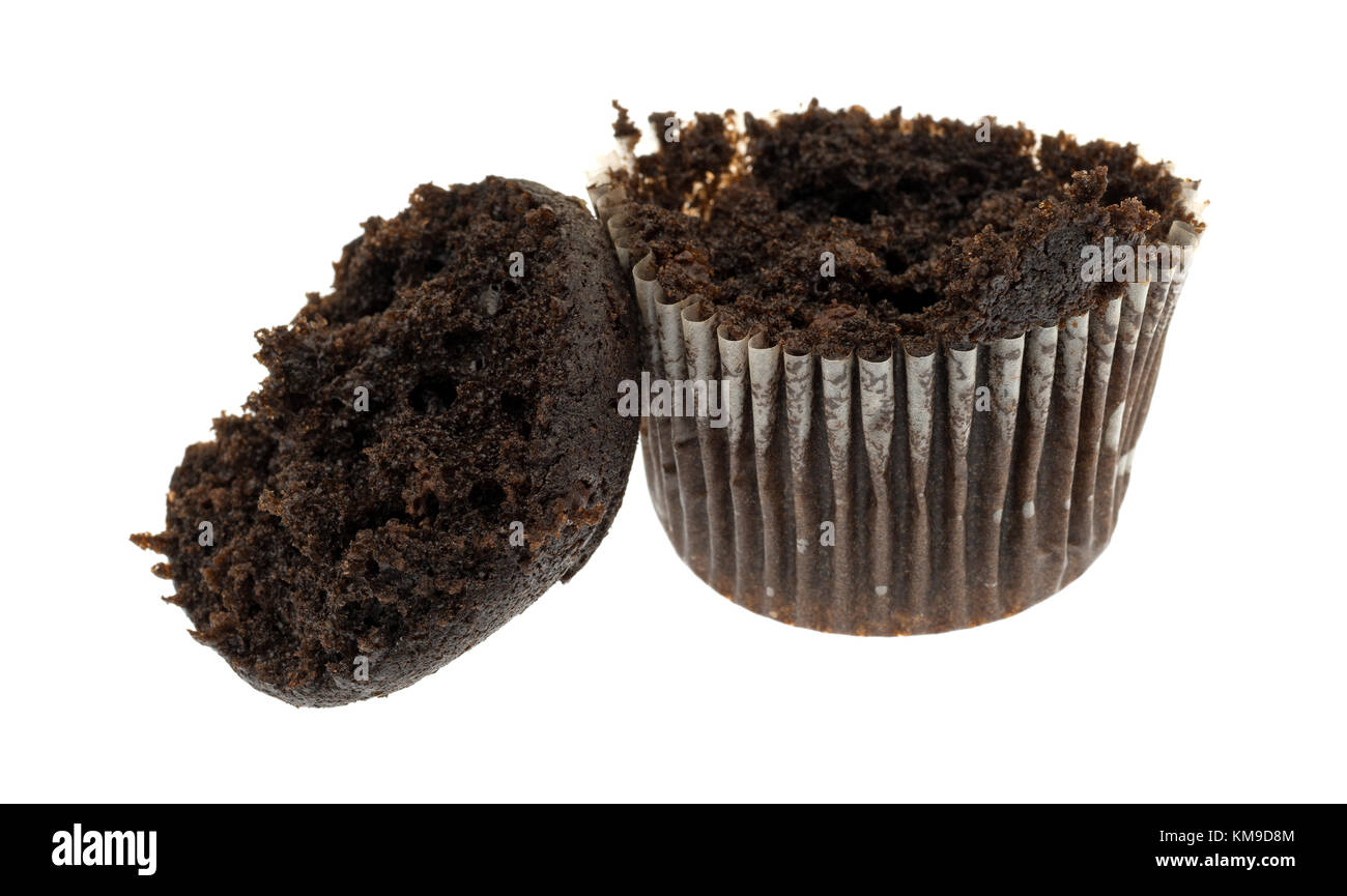 Side view of a bite size chocolate muffin with the top broken off ...