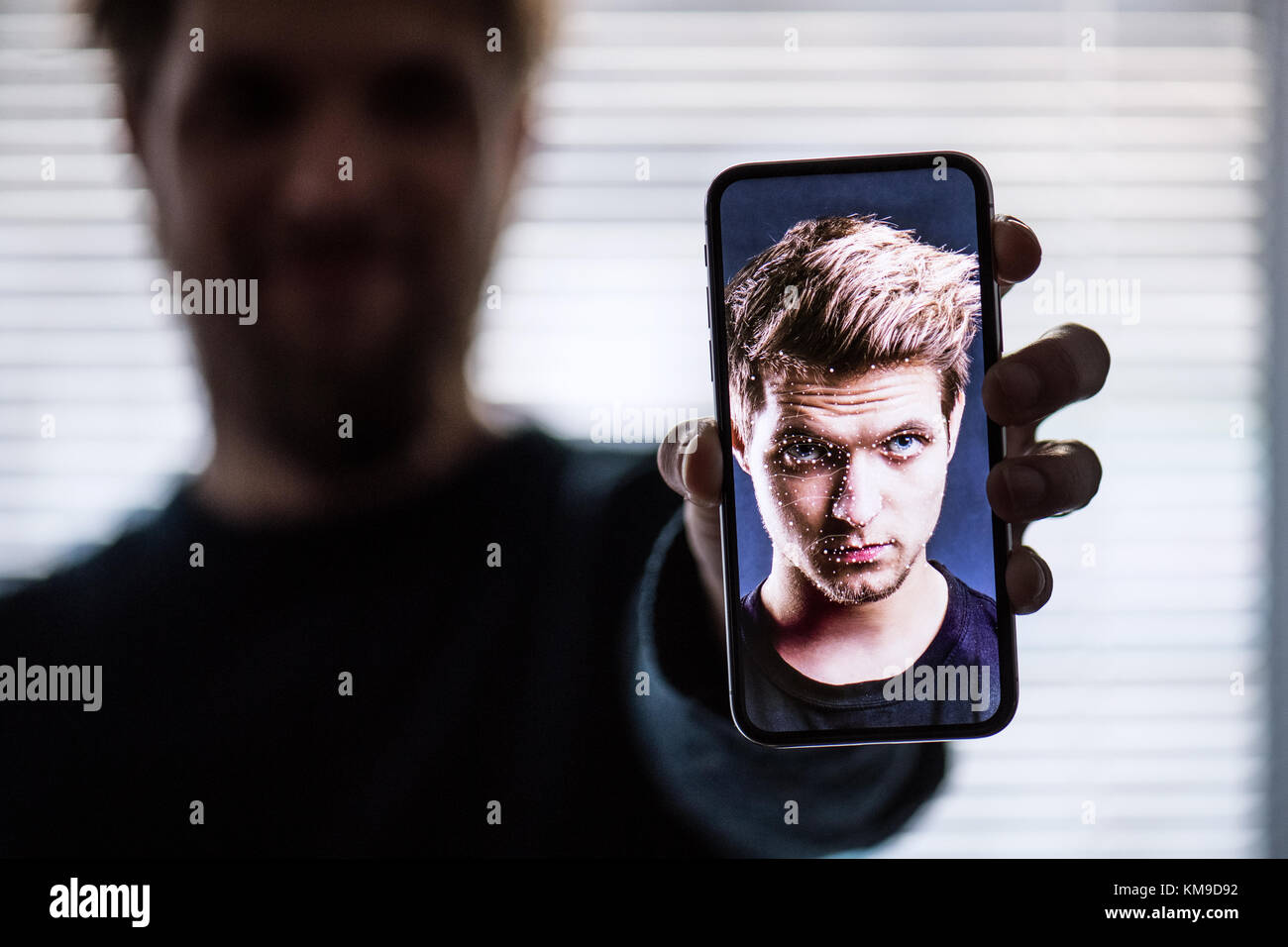 A smartphone using face ID recognition system Stock Photo - Alamy