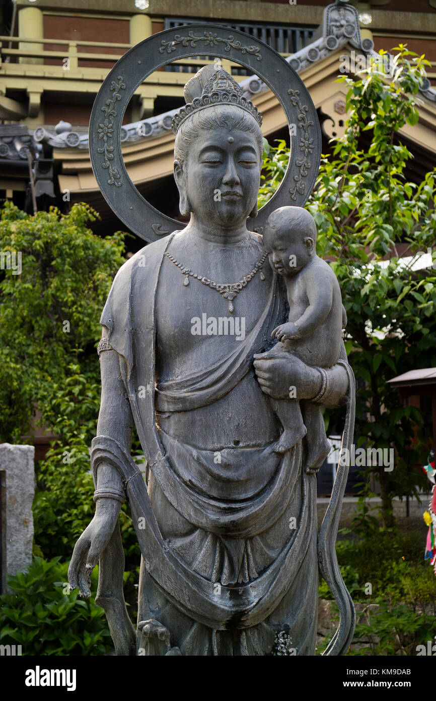 Nagano, Japan - June 3, 2017: Traditional stone carved Buddhist statue ...