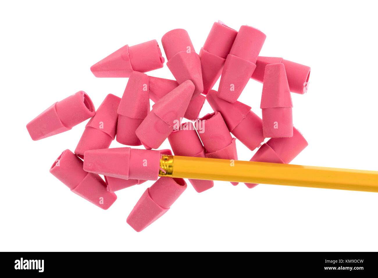 Top view of a group of synthetic rubber erasers with a yellow pencil on ...