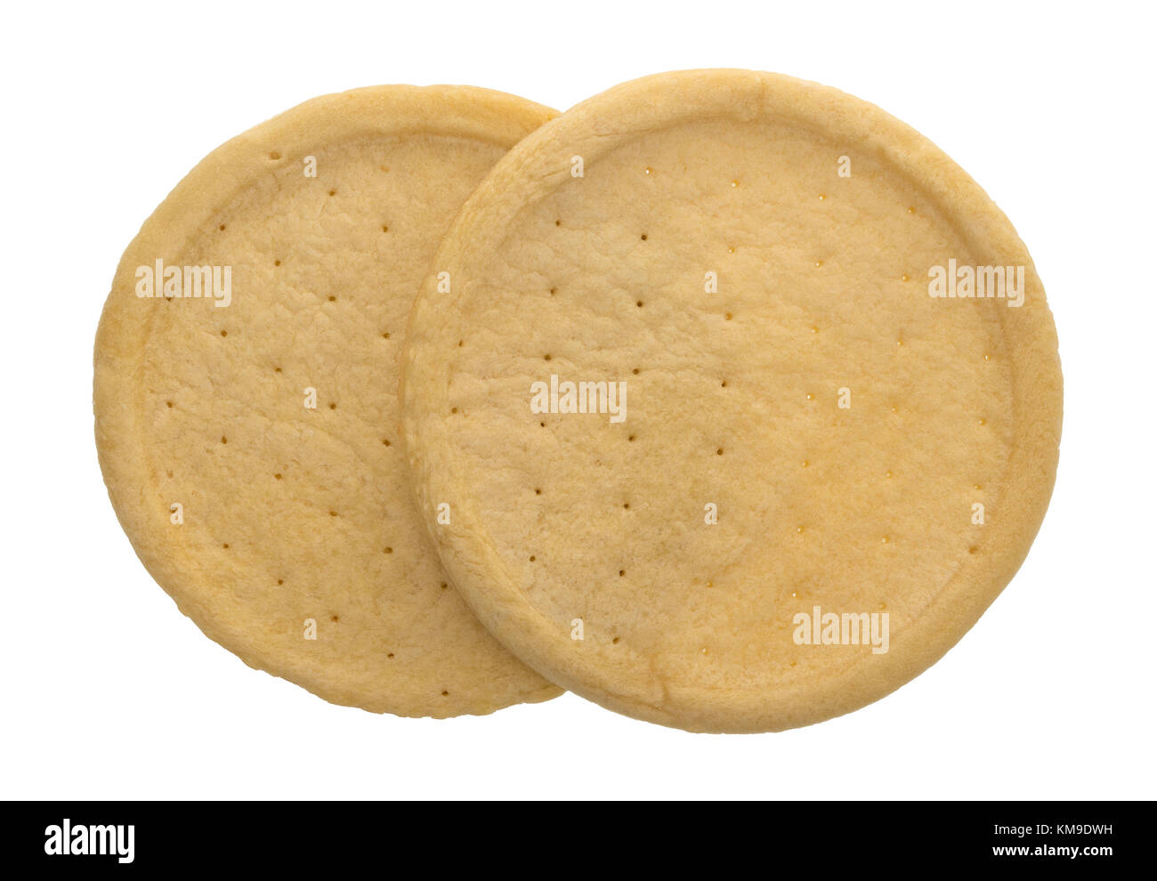 Top view of two ready made deep dish pizza crusts isolated on a white ...