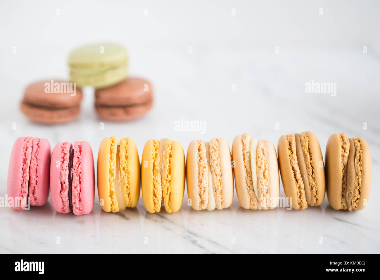 Macaroons on a marble table Stock Photo - Alamy