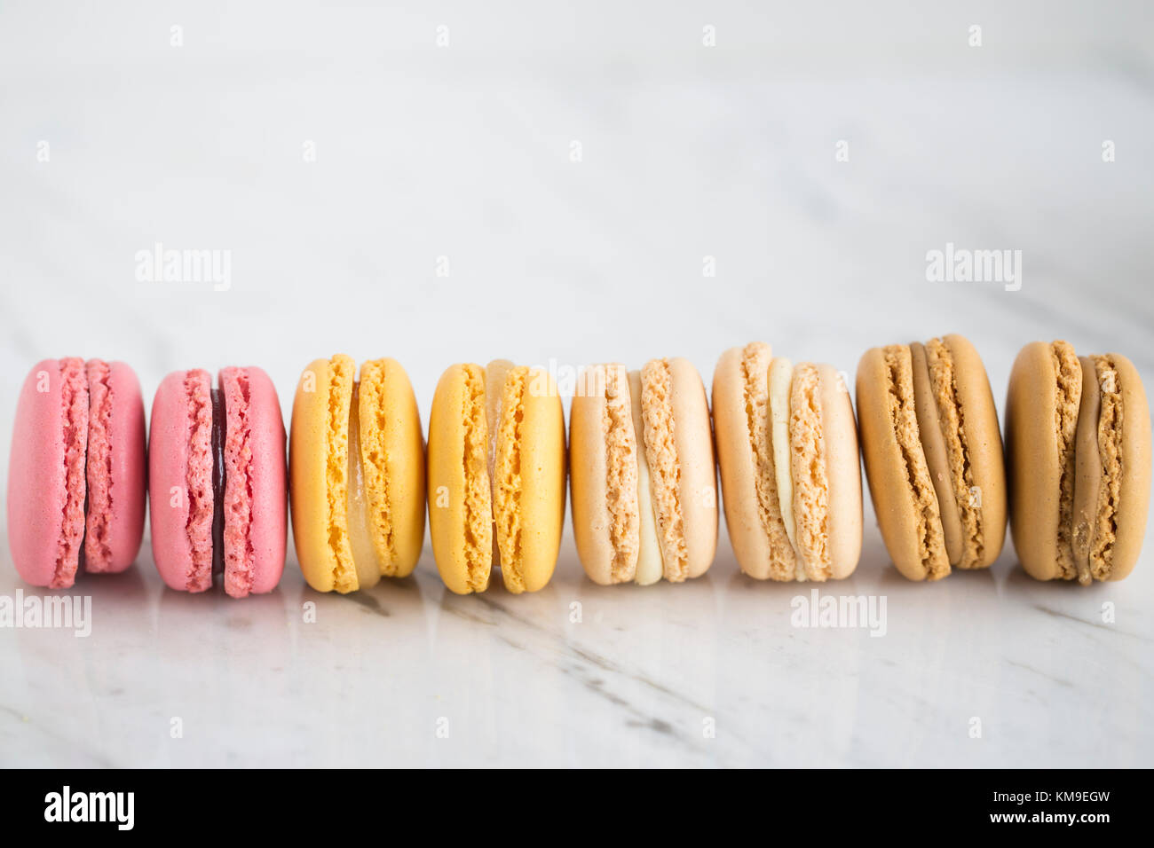 Macaroons on a marble table Stock Photo - Alamy