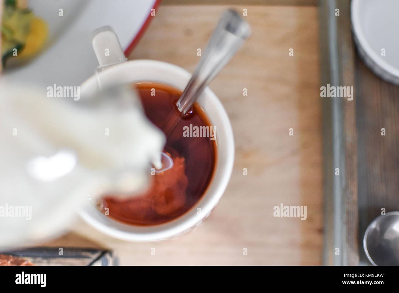 Pouring Milk into a cup of Tea Stock Photo - Alamy