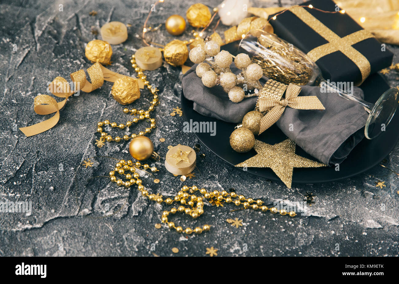 Christmas gift box with gold decorations Stock Photo - Alamy